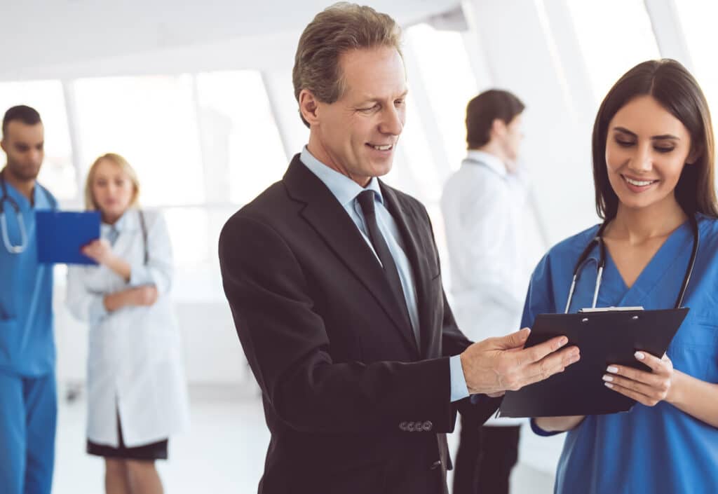 Doctor and businessman - Vector Medical Group