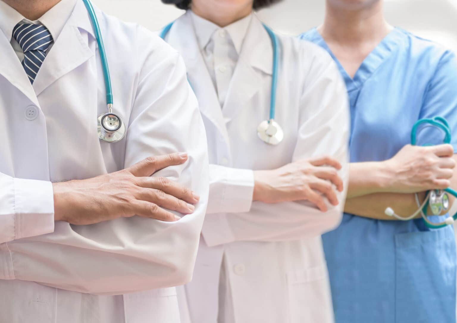 Medical doctors and surgeon professional team with clinic background ...